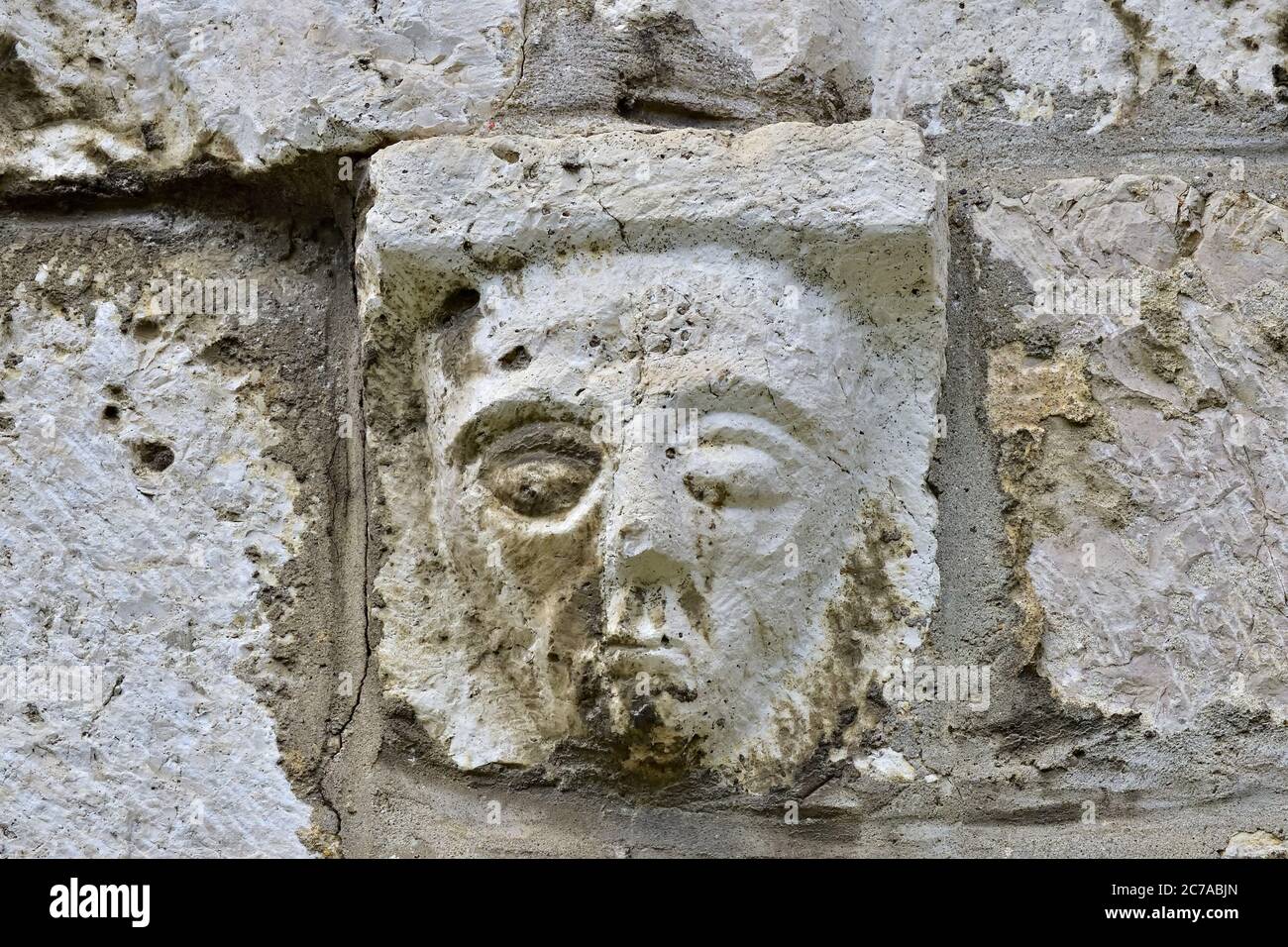 Stone Ornament of a Face on The Frieze of Purely Romanesque St. Gallus ...