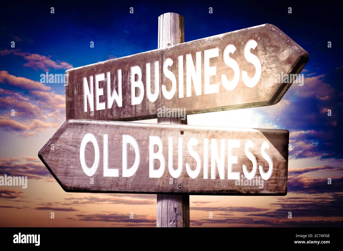 Old, new business - wooden signpost, roadsign with two arrows Stock ...