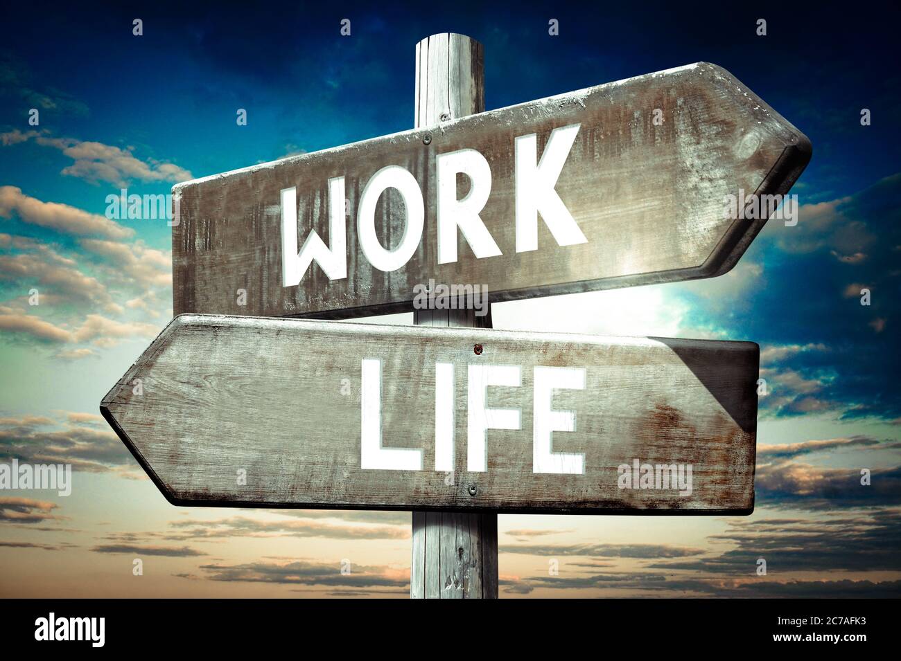 Work, life - wooden signpost, roadsign with two arrows Stock Photo - Alamy