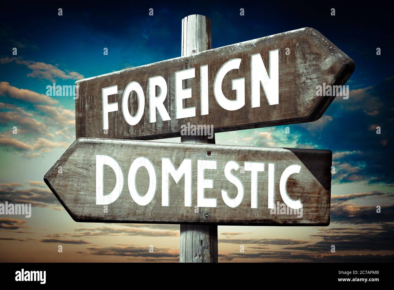 Foreign, domestic - wooden signpost, roadsign with two arrows Stock ...