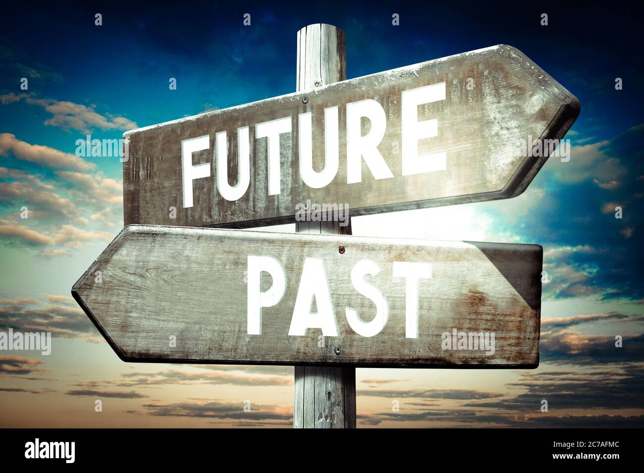 Future, past - wooden signpost, roadsign with two arrows Stock Photo ...