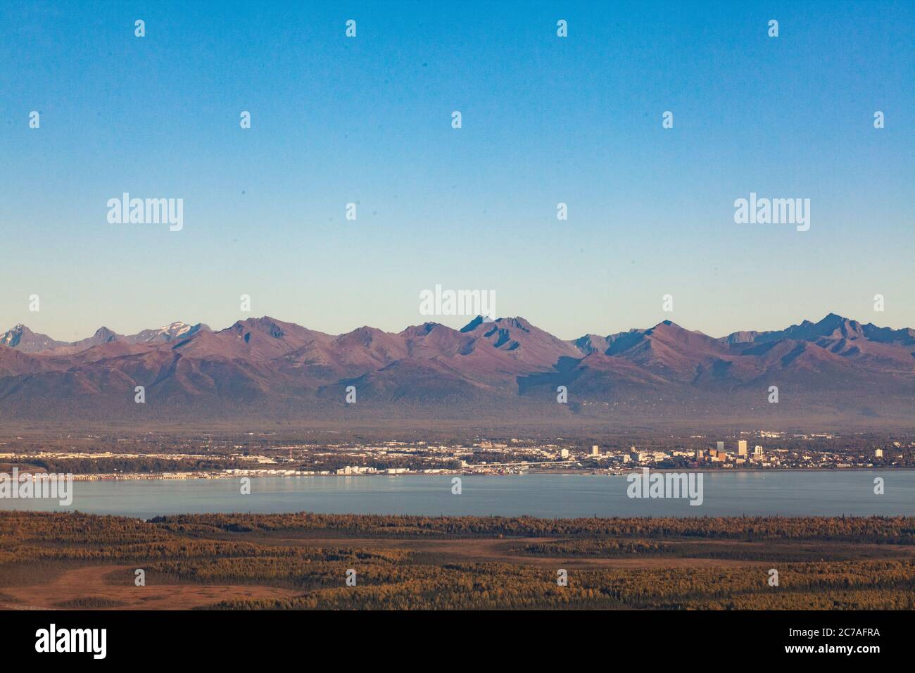 A panoramic view of Anchorage, Alaska, with the Chugach Mountains ...