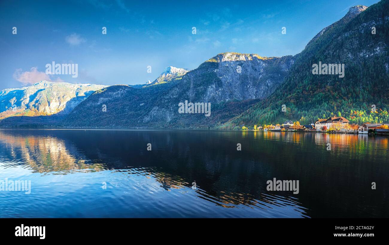 Scenic view of famous Hallstatt mountain village with Hallstatter lake ...