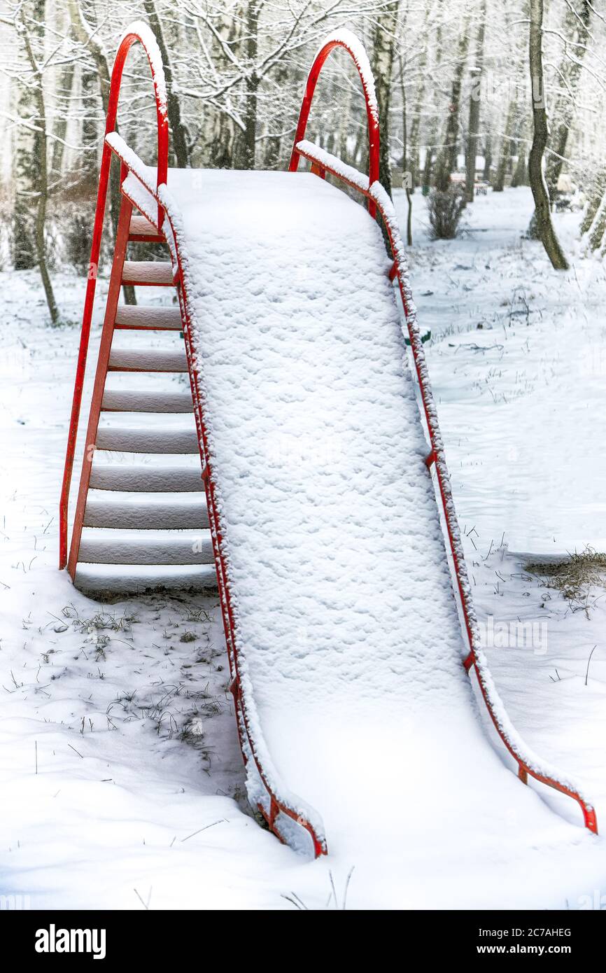 Empty children playground in winter day. Sunset time Stock Photo - Alamy