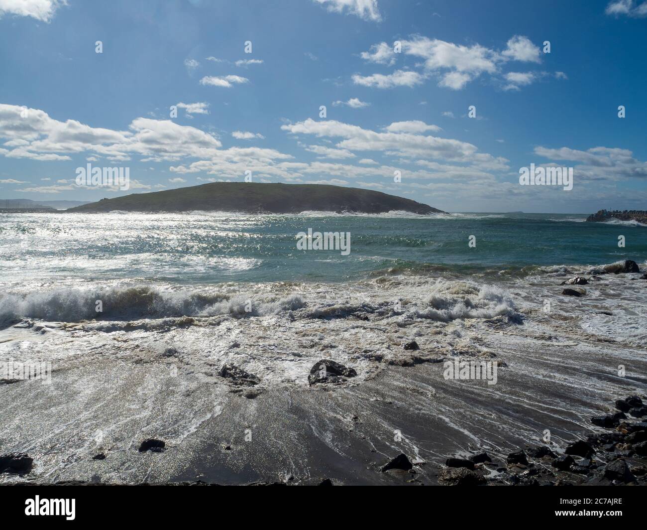 Muttonbird Island from across the other side of the Harbour, gentle ...