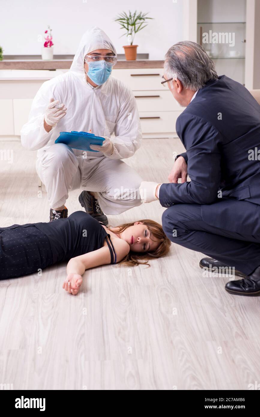 Forensic experts at the crime scene at home Stock Photo - Alamy