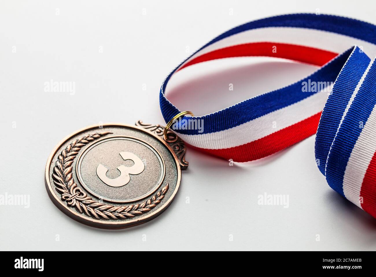 Bronze medal. Third place award with ribbon Stock Photo - Alamy