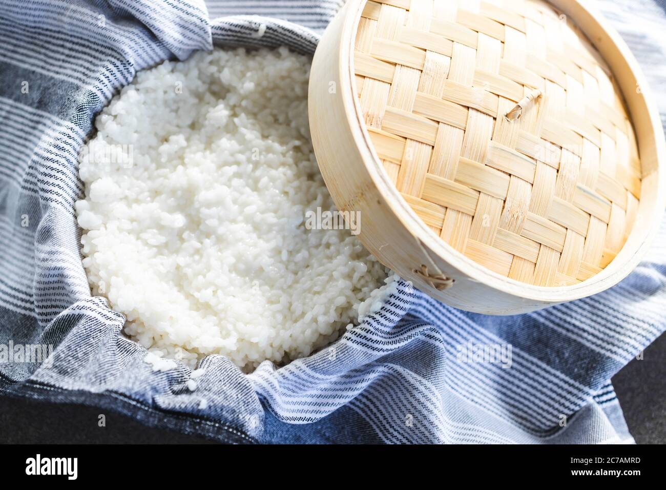 simple food ingredients concept, sticky sushi rice in traditional asian ...