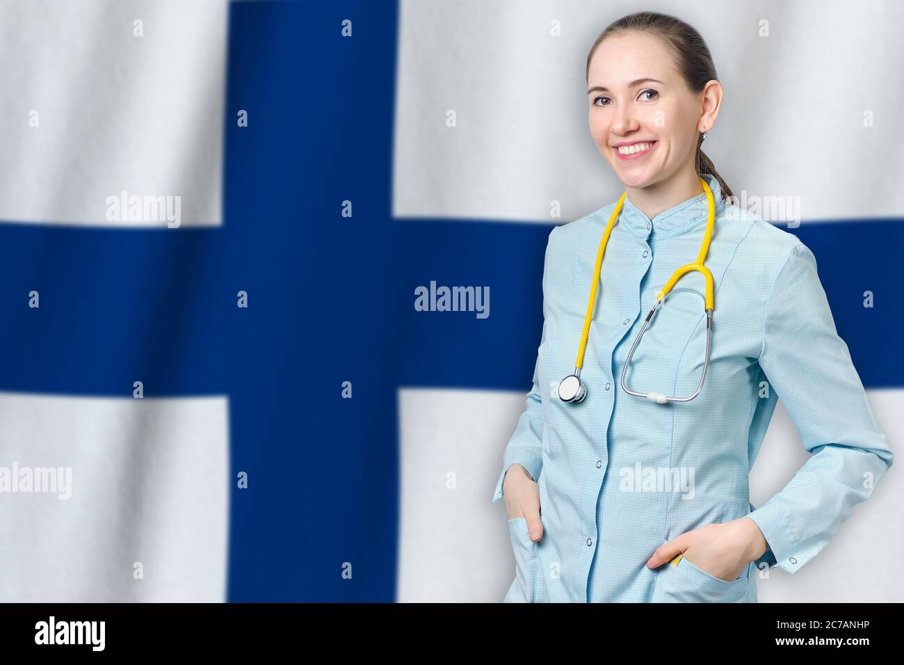 Republic of Finland healthcare concept with doctor on flag background ...