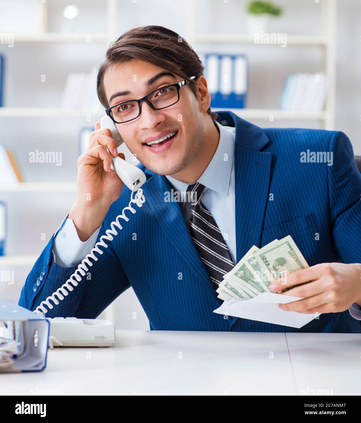 The businessman receiving his salary and bonus Stock Photo - Alamy
