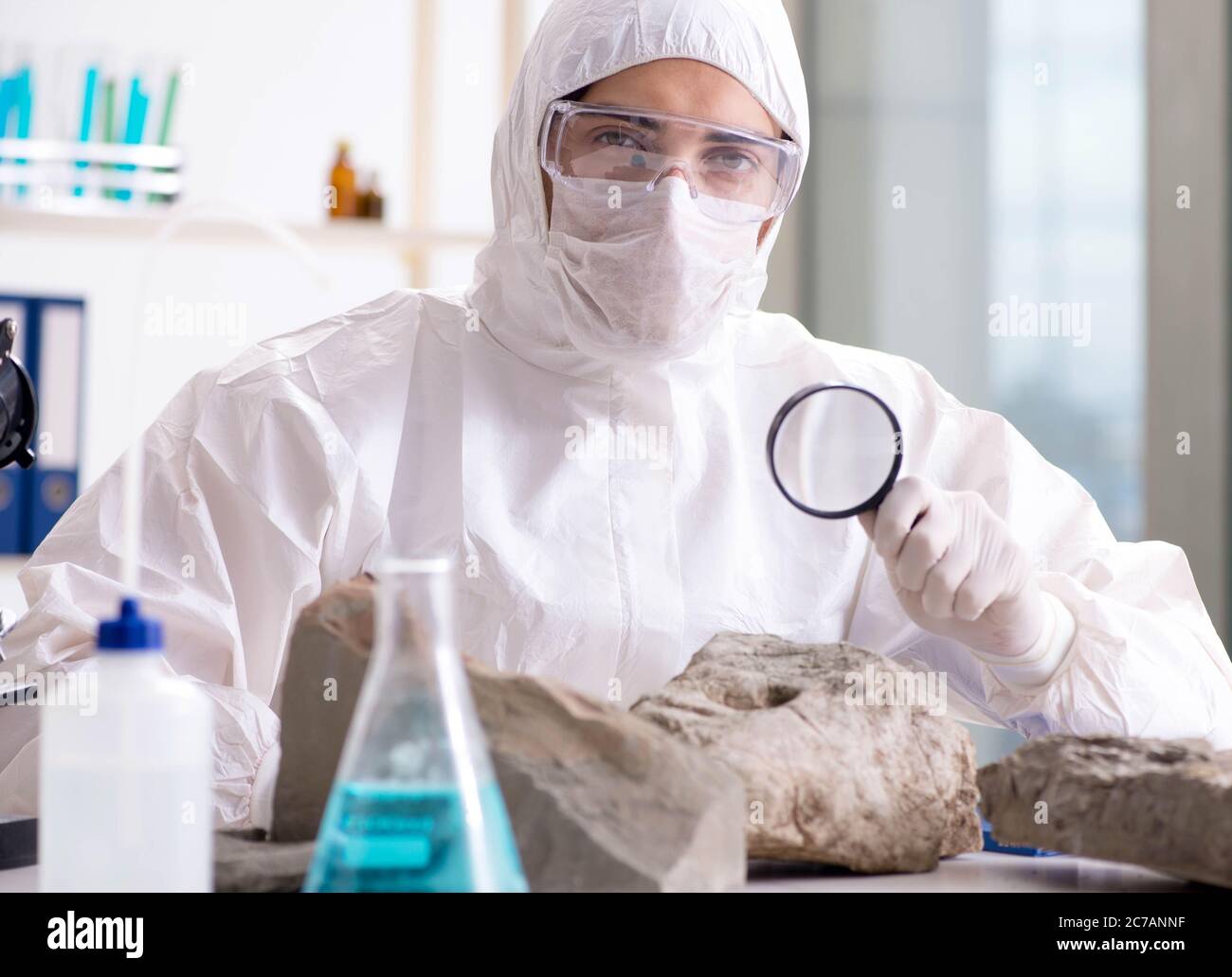 The scientist looking and stone samples in lab Stock Photo - Alamy