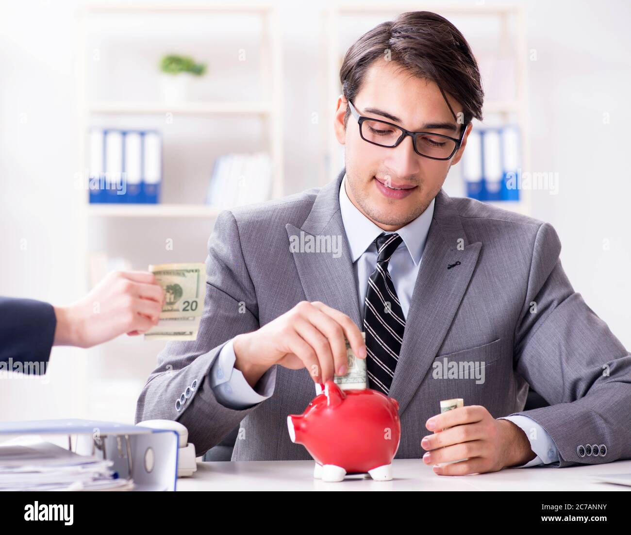 Businessman being offered bribe for breaking law Stock Photo - Alamy