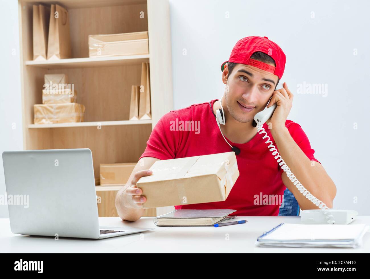 The call center worker at parcel distribution center in post office ...