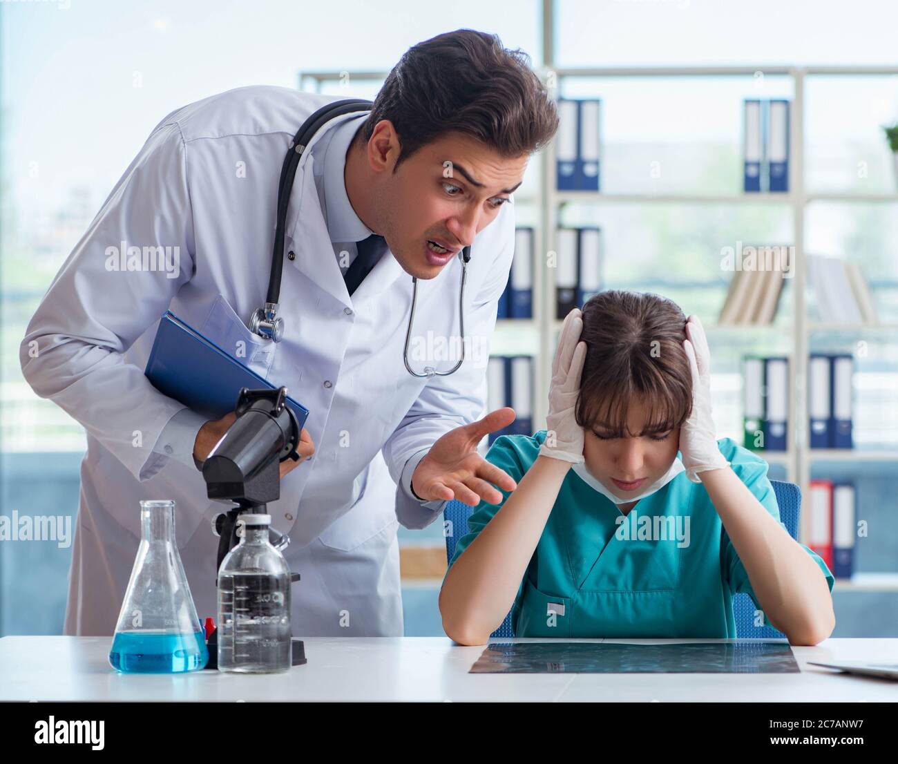 Medical assistant explaining radiography scan hi-res stock photography ...