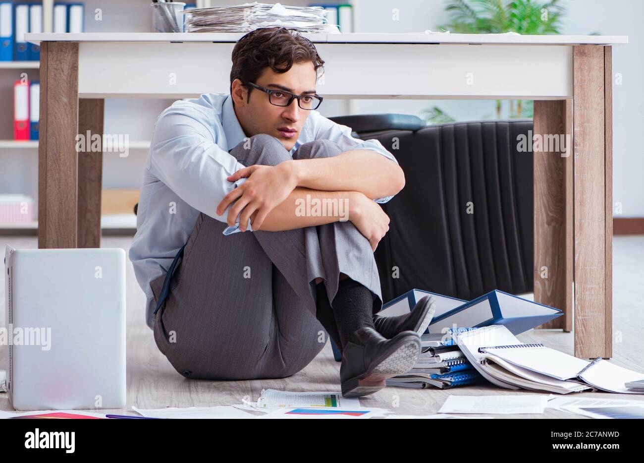 The bankrupt businessman angry in the office floor Stock Photo - Alamy
