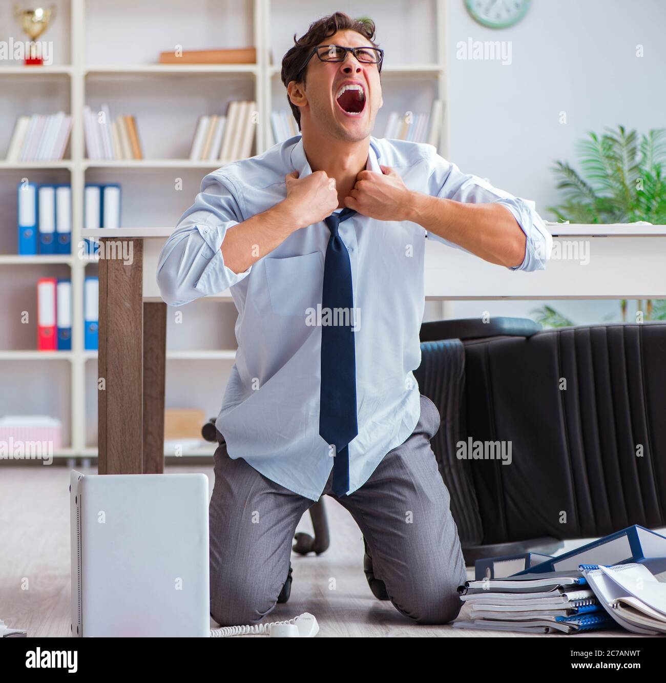 The bankrupt businessman angry in the office floor Stock Photo - Alamy