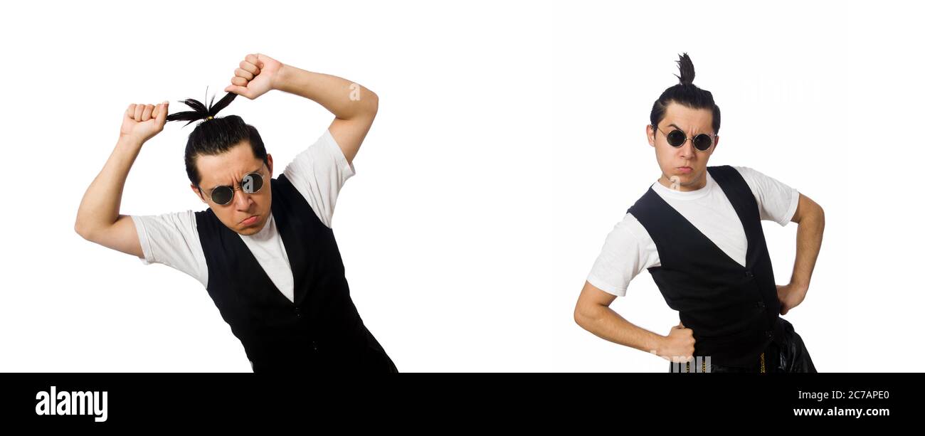 The funny young man dancing isolated on white Stock Photo - Alamy