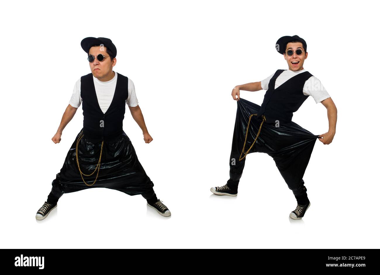 The funny young man dancing isolated on white Stock Photo - Alamy