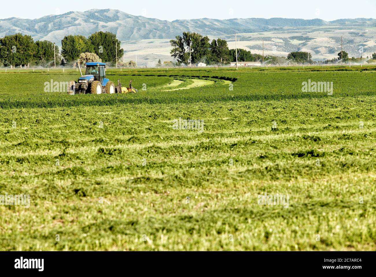 Agriculture hay bales tractor farm mower hi-res stock photography and ...