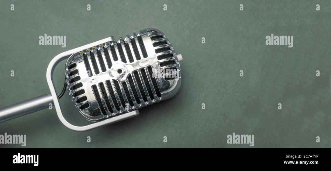 Vintage Microphone banner with green area copy space Stock Photo - Alamy