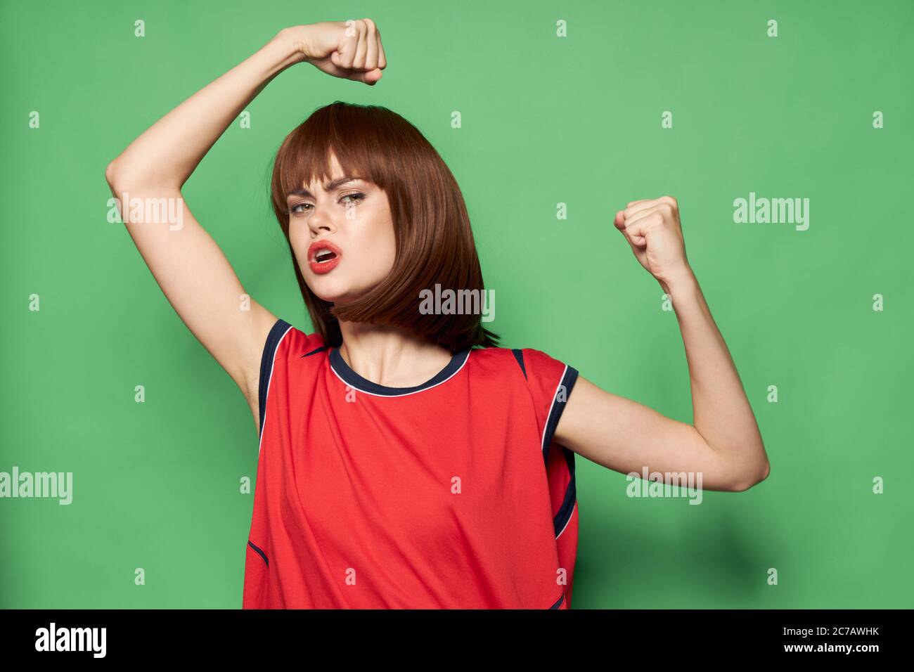 Strong woman clenched her hands into a fist Stock Photo - Alamy