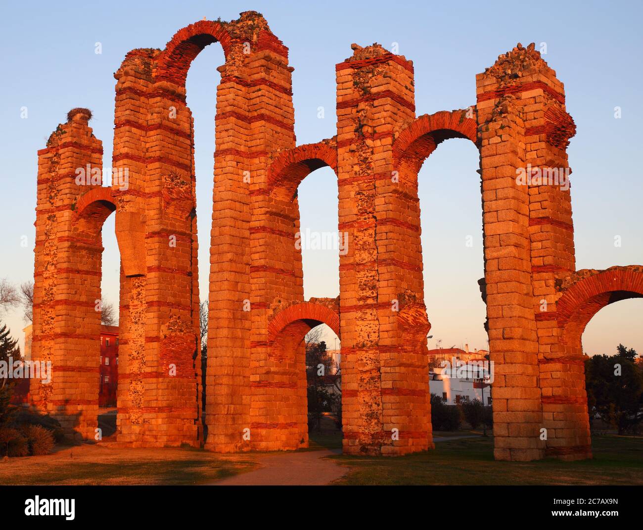 Acueducto De Los Milagros, Roman aqueduct. Lit by the late afternoon ...
