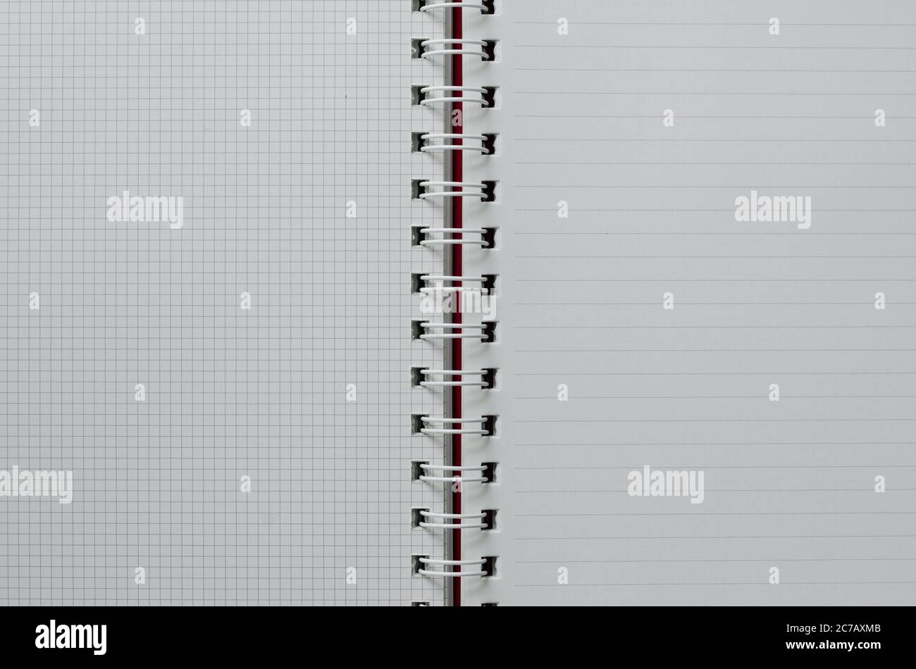 Wirebound Notebook Open with Lined and Grid Paper Stock Photo - Alamy