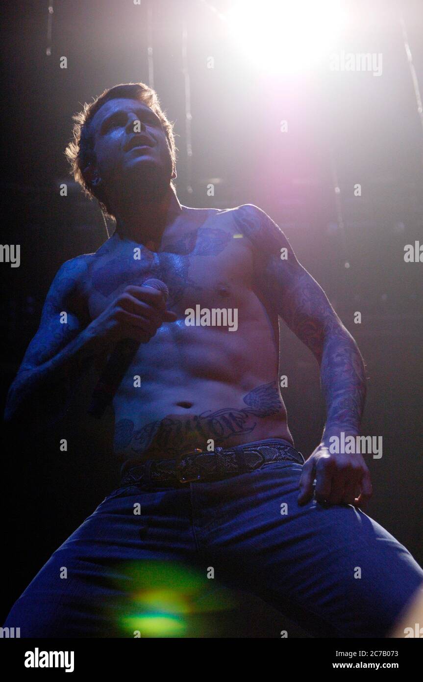 Singer Alex Varkatzas of Atreyu performing at the 2008 Rockstar Taste ...