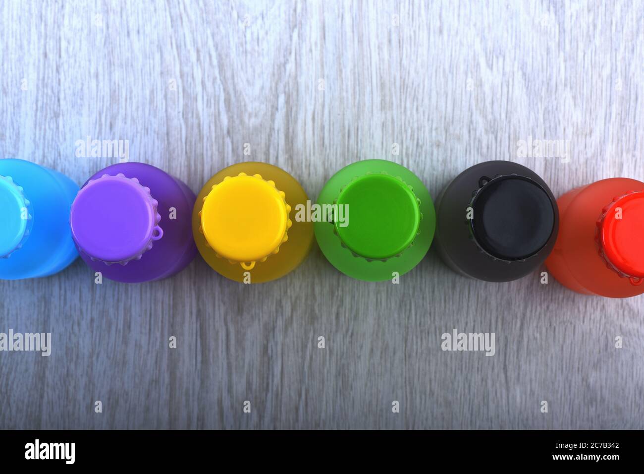 Set of bottles in different color. Energy drinks containers with ...