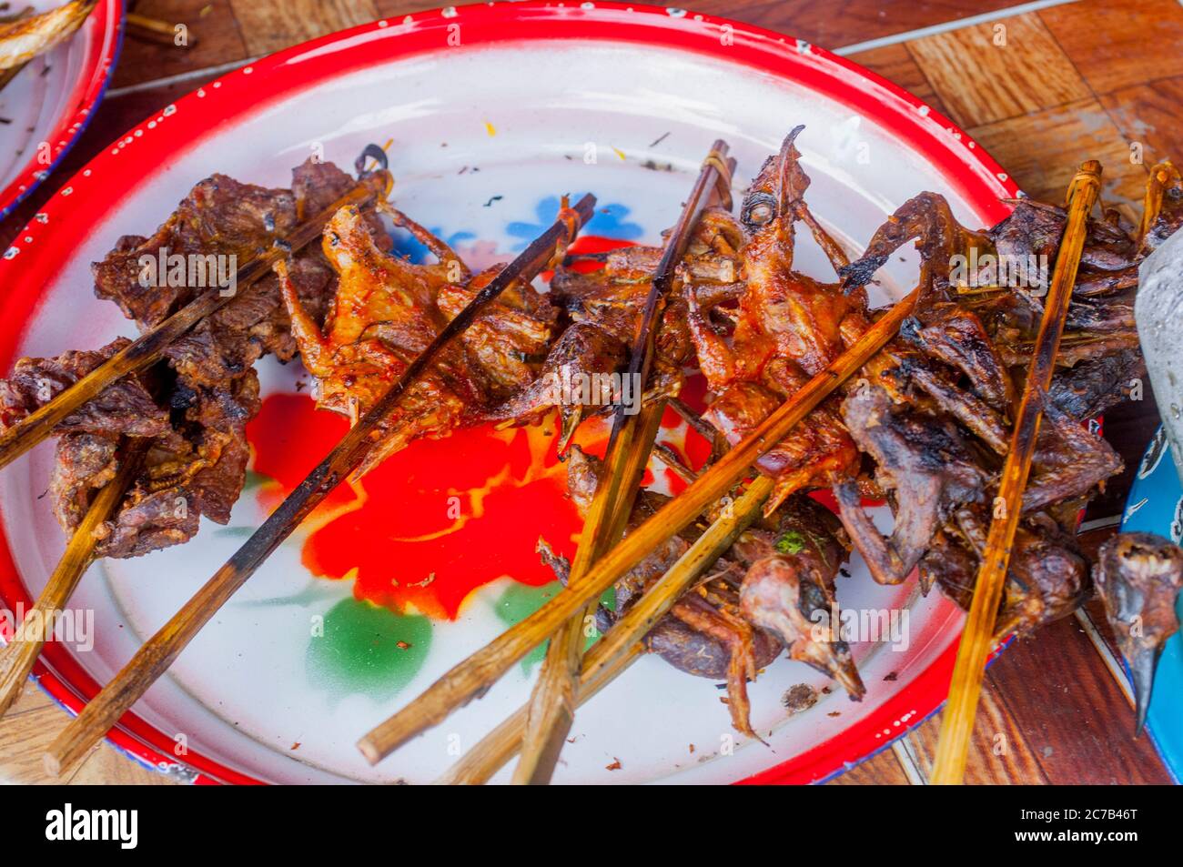 Fried songbirds for sale at a street market in Phou Khoun, Laos Stock ...