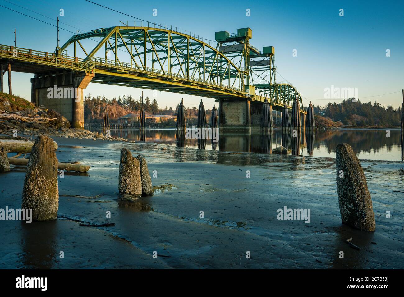 Bullards Bridge in Bandon, Oregon. Old Pilings in foreground Stock ...