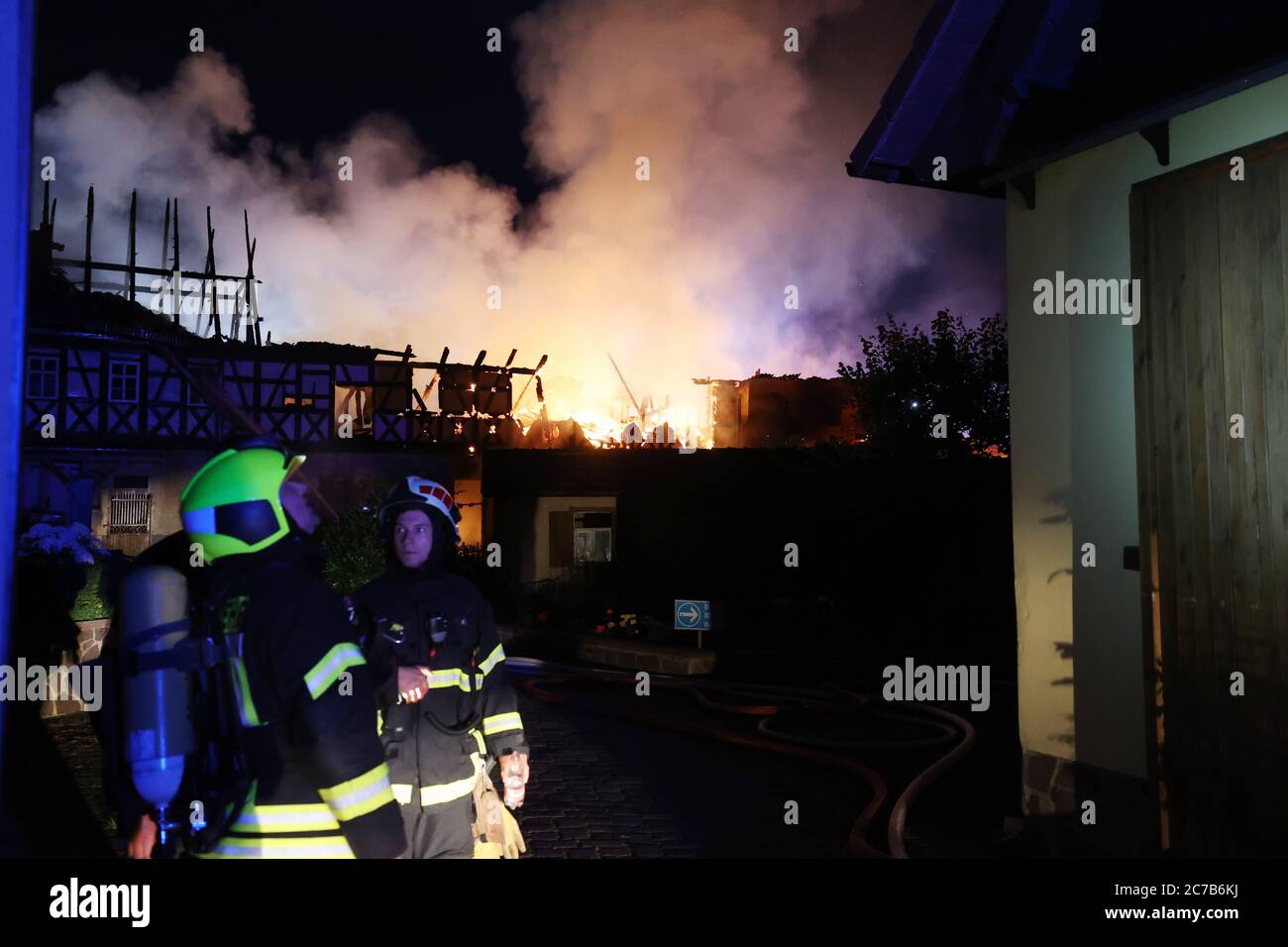 Altenburg, Germany. 16th July, 2020. Firefighters fight a fire on a ...
