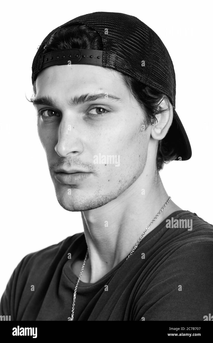 Face of young handsome man wearing snapback Stock Photo - Alamy