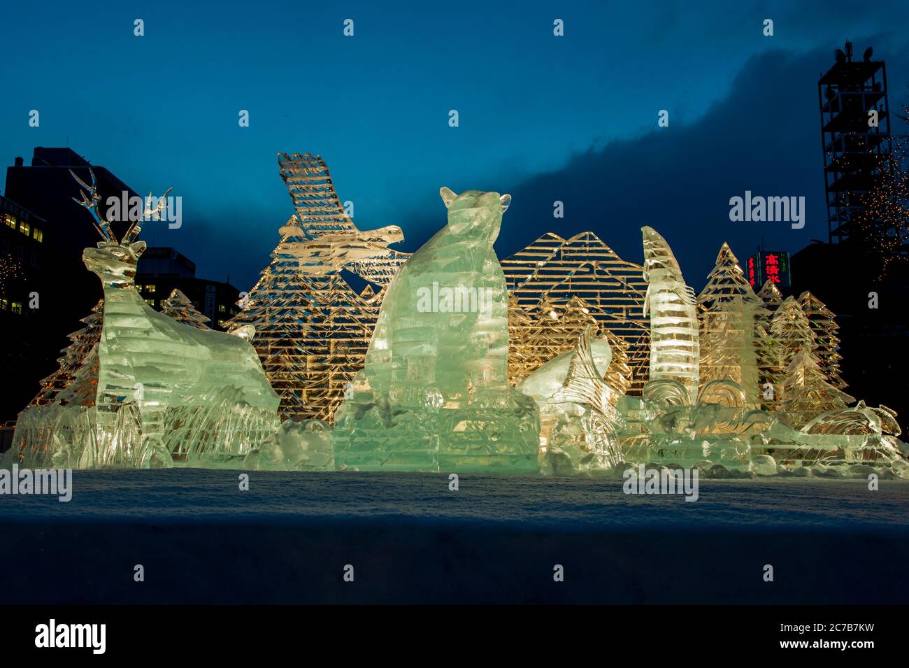 Ice sculptures illuminated at night at the Sapporo Snow Festival in Sapporo, Hokkaido Island ...