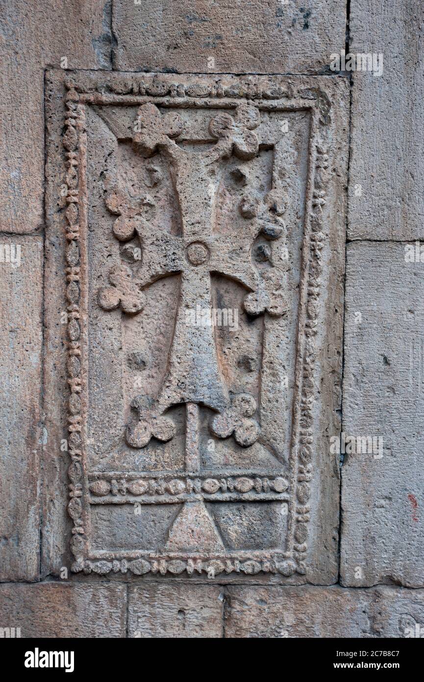 A cross carved into the stone at Geghard, a medieval monastery ...