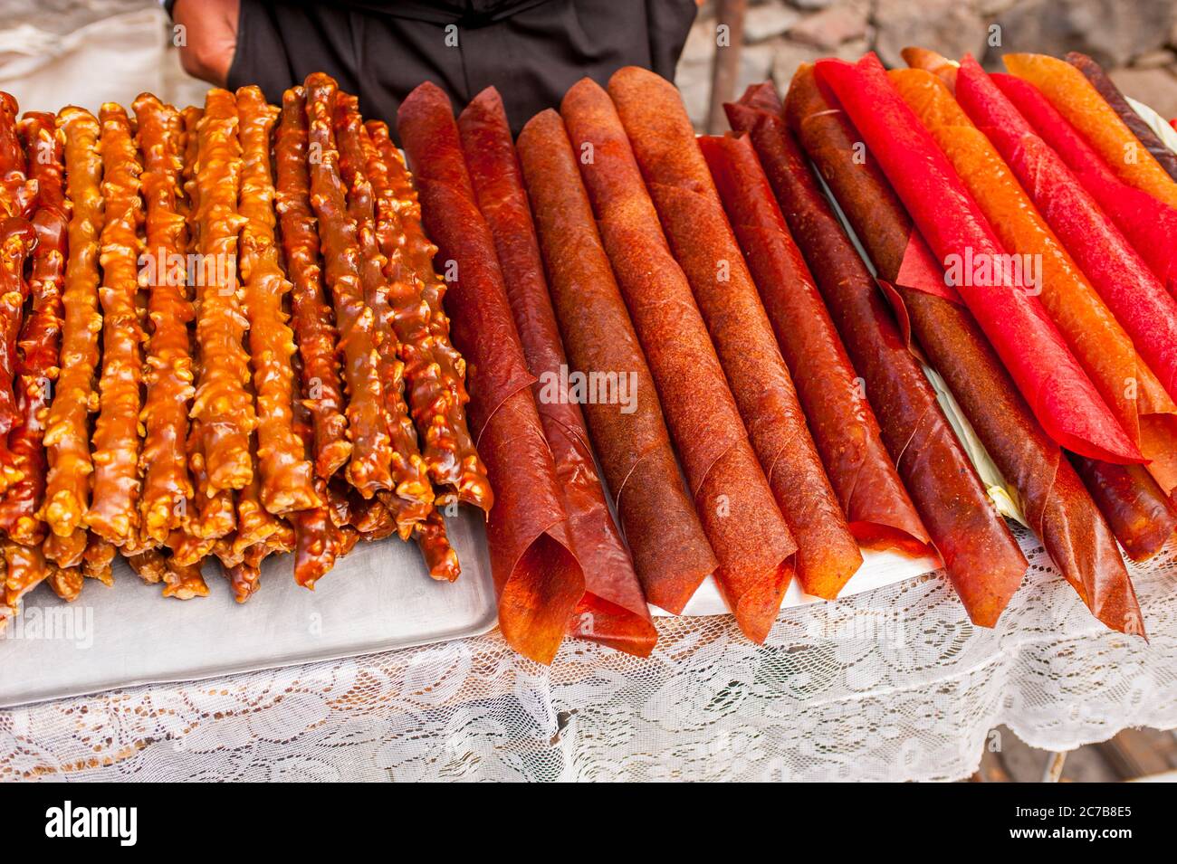 Fruit rolls are being sold in front of Geghard, a medieval monastery ...