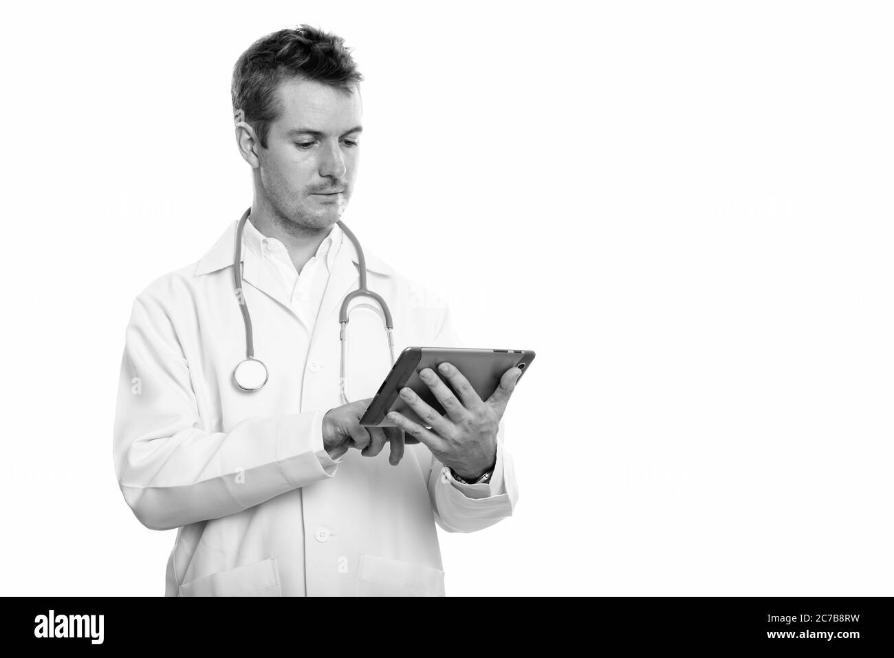 Black man doctor tablet Cut Out Stock Images & Pictures - Alamy