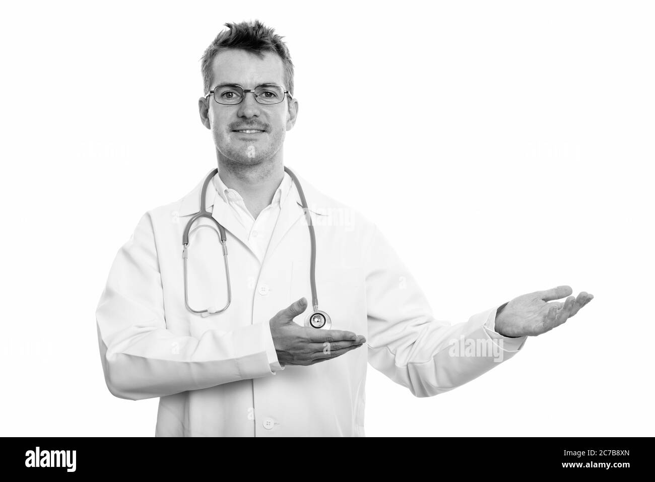 Medical doctor man happy showing Black and White Stock Photos & Images ...