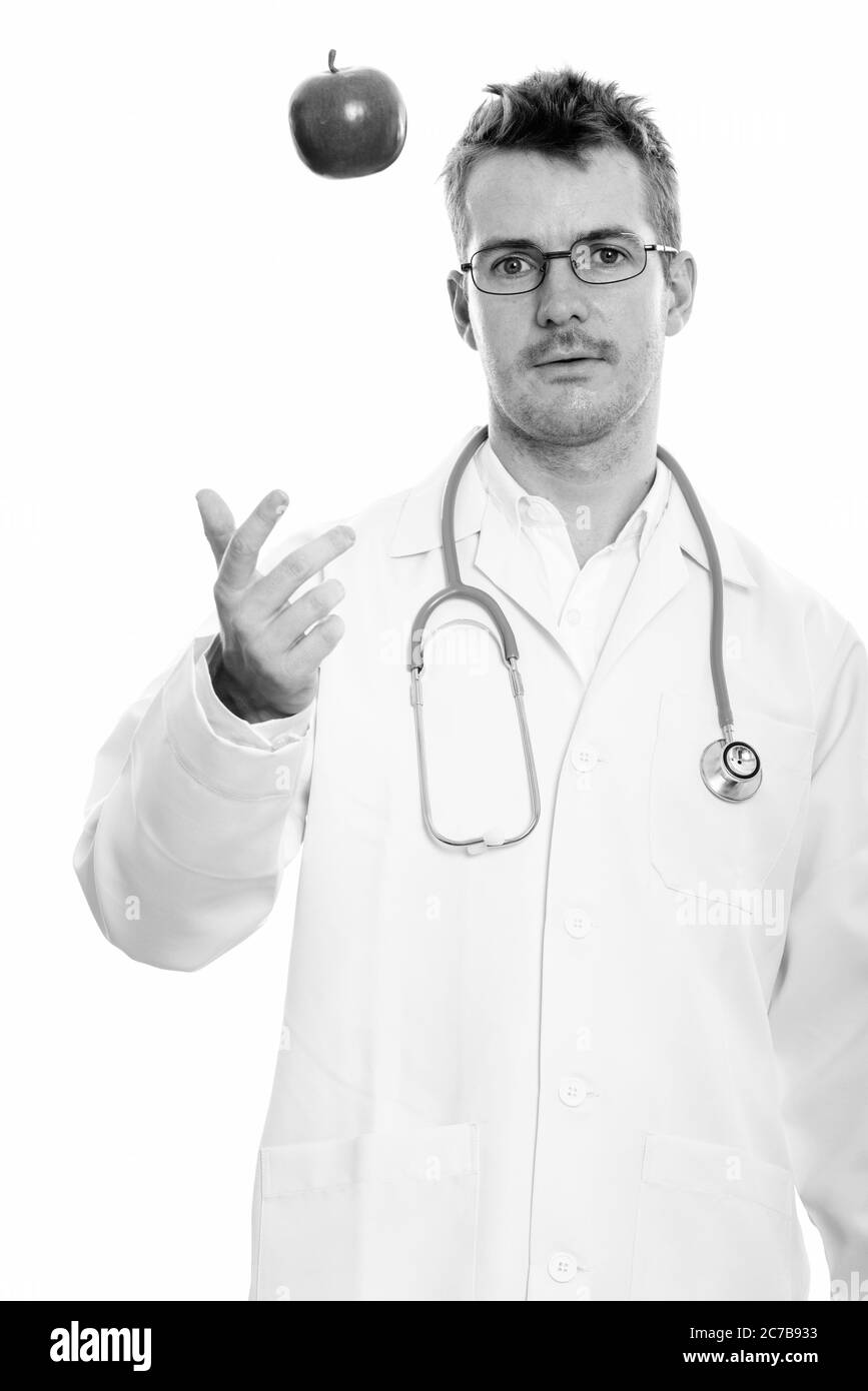 Throwing an apple Black and White Stock Photos & Images - Alamy