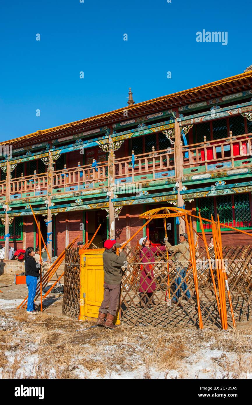 People setting up a ger in the courtyard of the Manjusri Monastery, a ...
