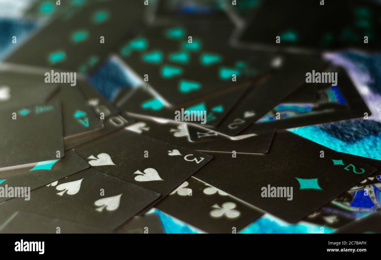 Playing poker cards spread out and mixed face up. A spread is simply a ...