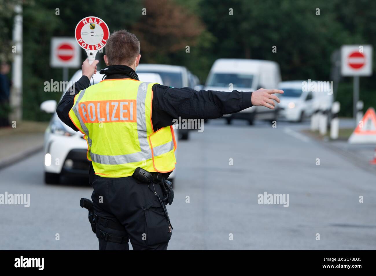 Policeman holding stick hi-res stock photography and images - Alamy