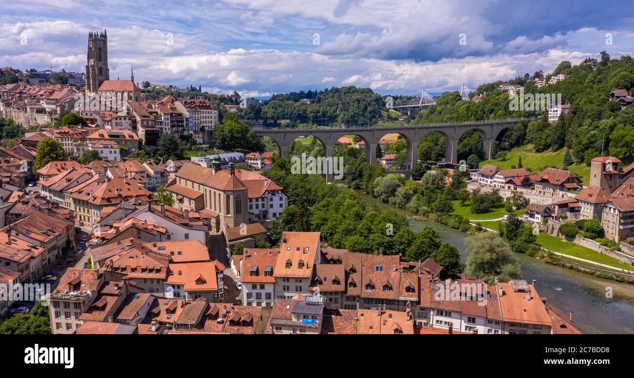 Aerial views of the rooftops, landmarks, river and bridges of the old ...