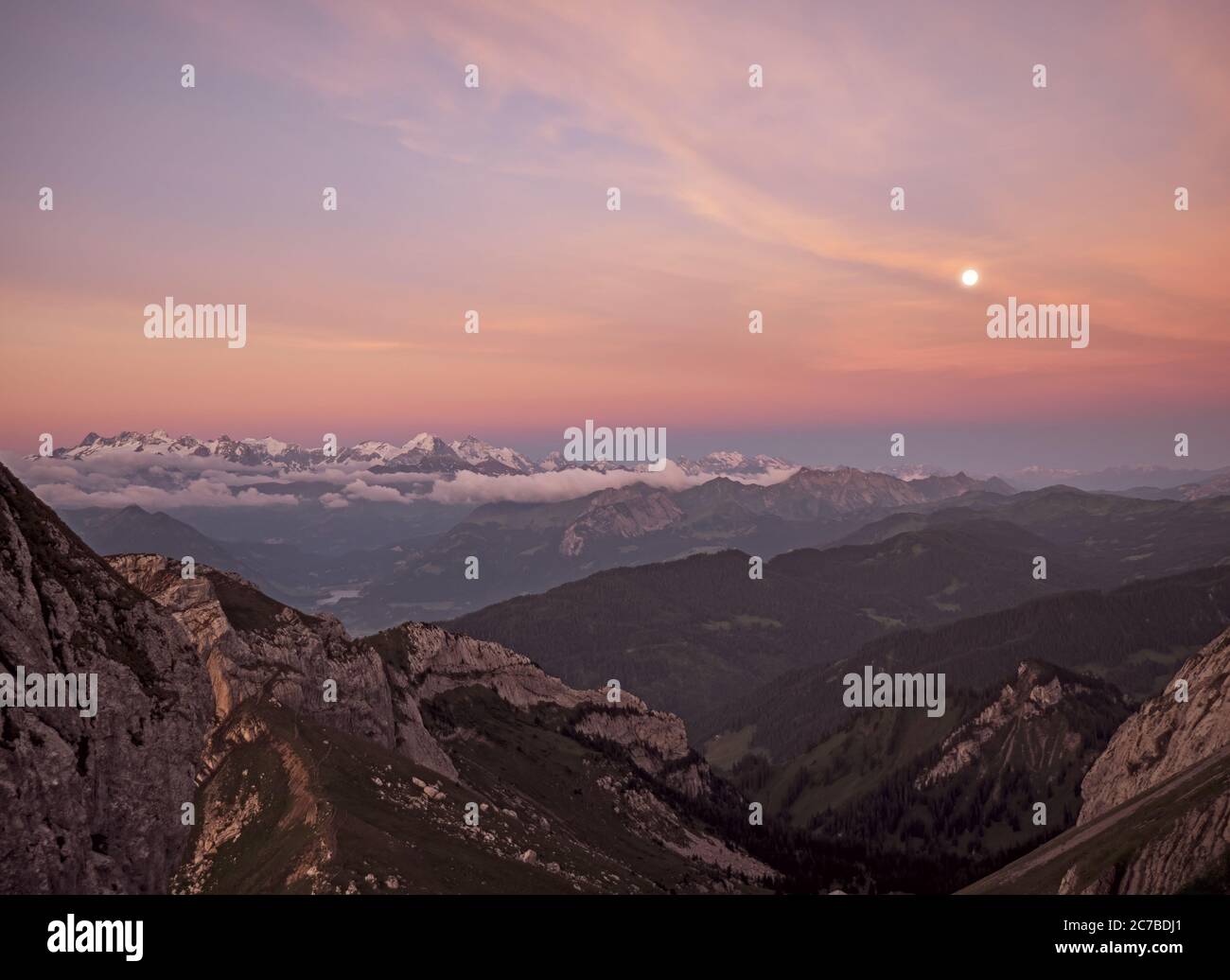Moon rise shot taken from the peak of mount pilatus overlooking the ...