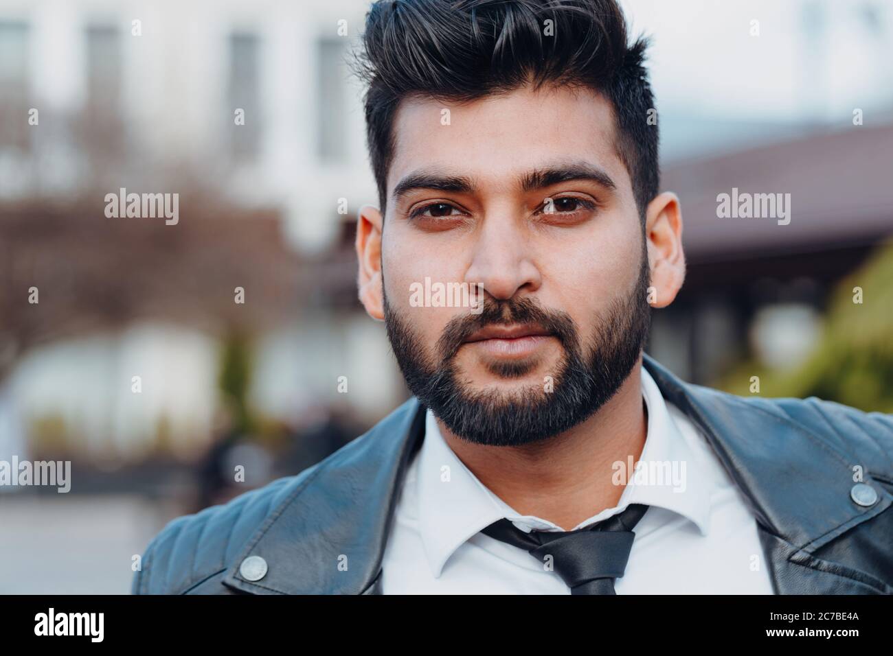 Indian man face looking down hi-res stock photography and images - Alamy