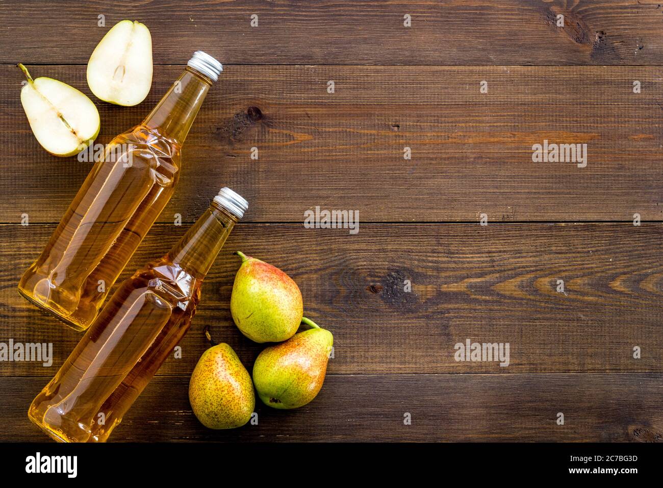Bottles of beer with peer from above space for text Stock Photo - Alamy