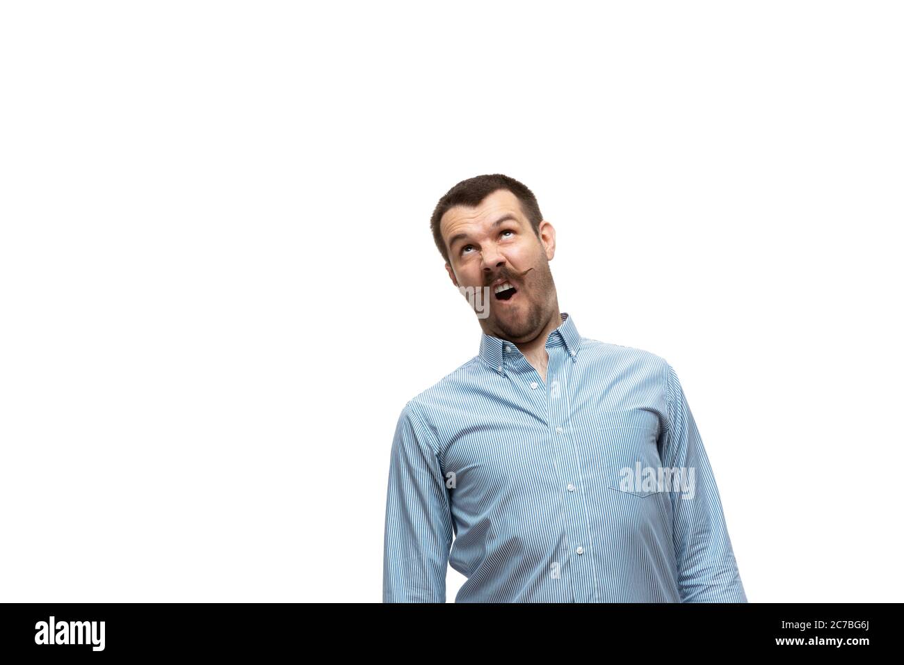 Rock star. Young man with funny, unusual popular emotions and gestures ...