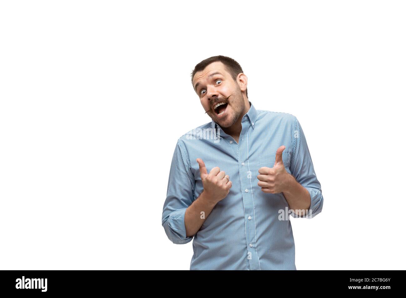 Highly approved. Young man with funny, unusual popular emotions and ...