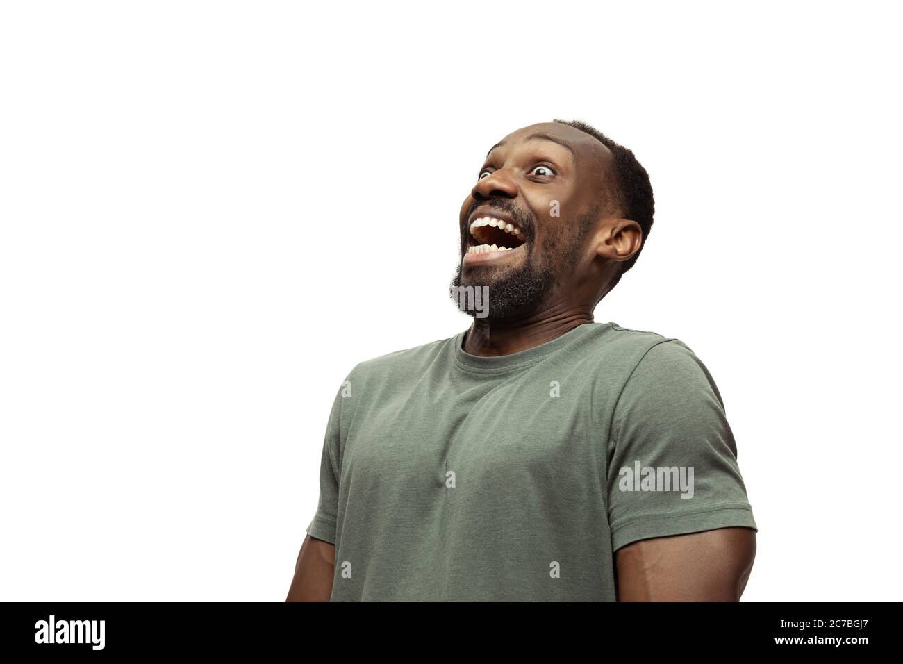 Laughting mad. Young african-american man with funny, unusual popular ...