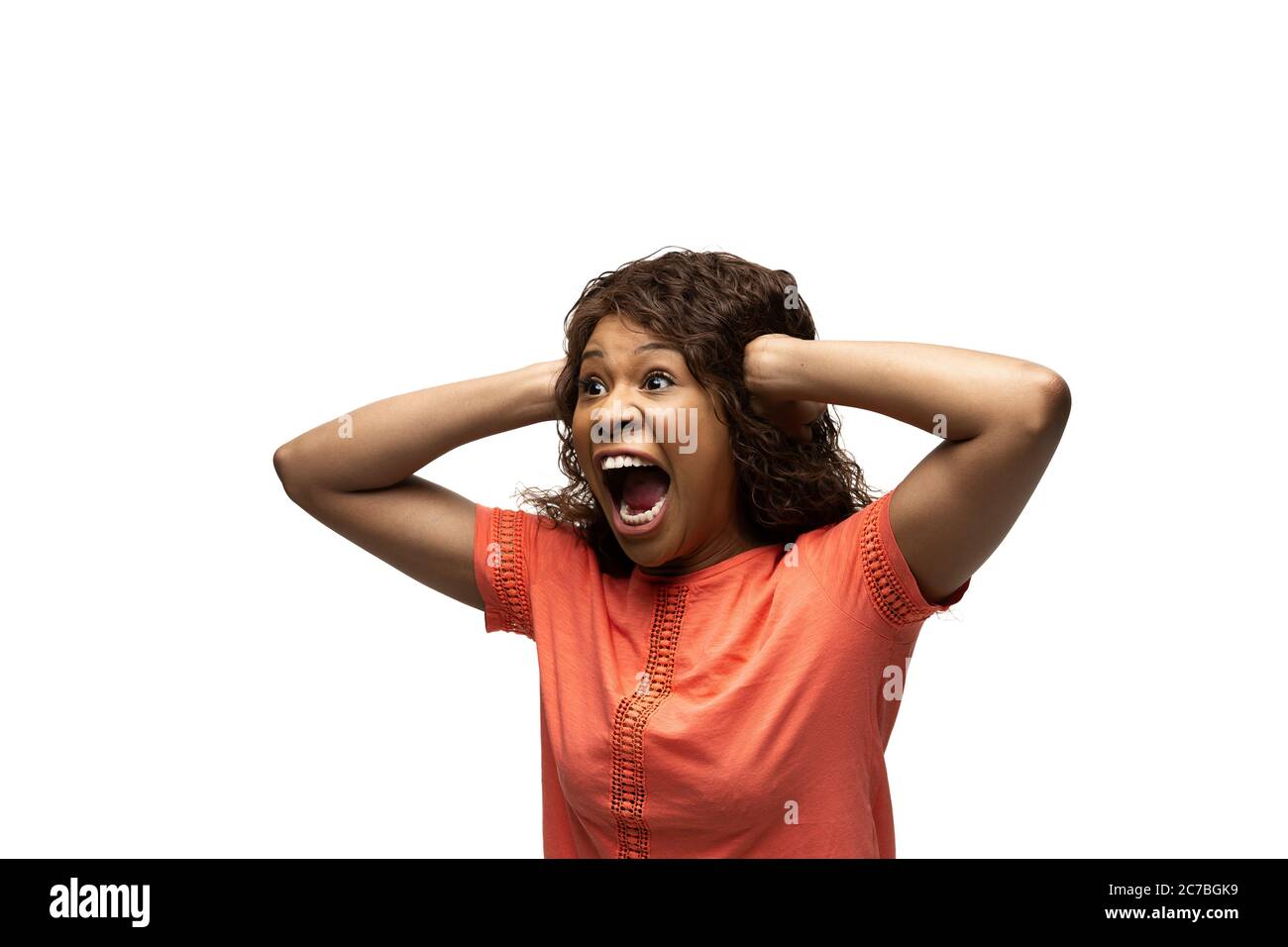 Scared screaming. Young african-american woman with funny, unusual ...